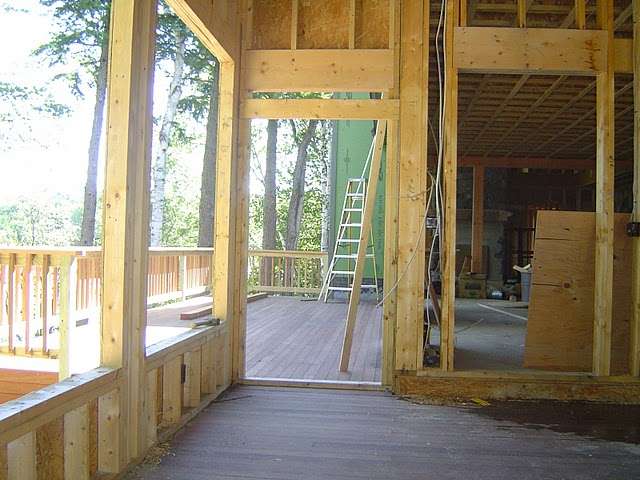 Damaged Wet Subfloor During Home Construction - HomeAdditionPlus.com